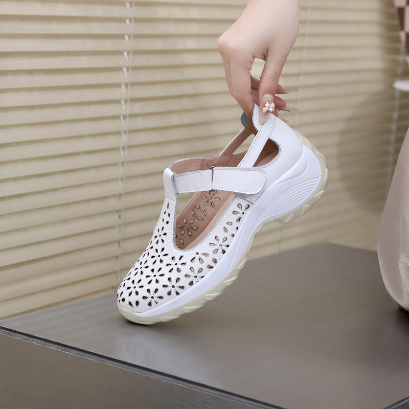 Comfortable flat heeled women's shoes with laser cut holes in the cowh ...